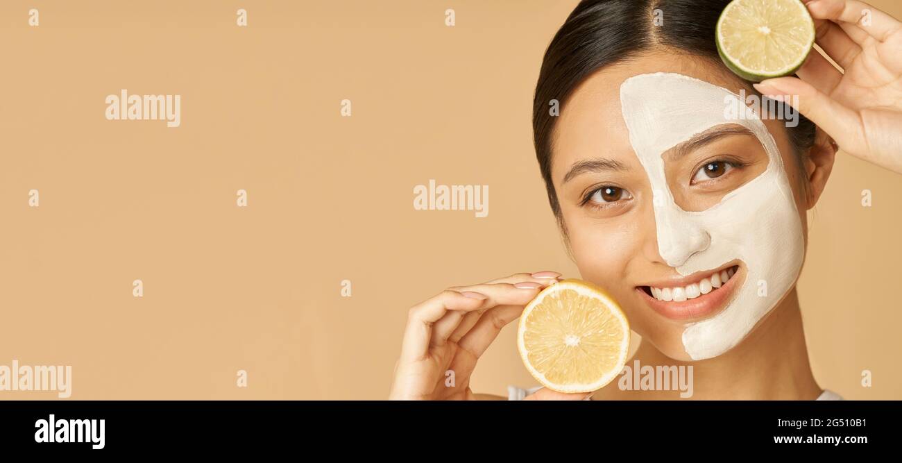 Website header of Beauty portrait of young woman with facial mask ...