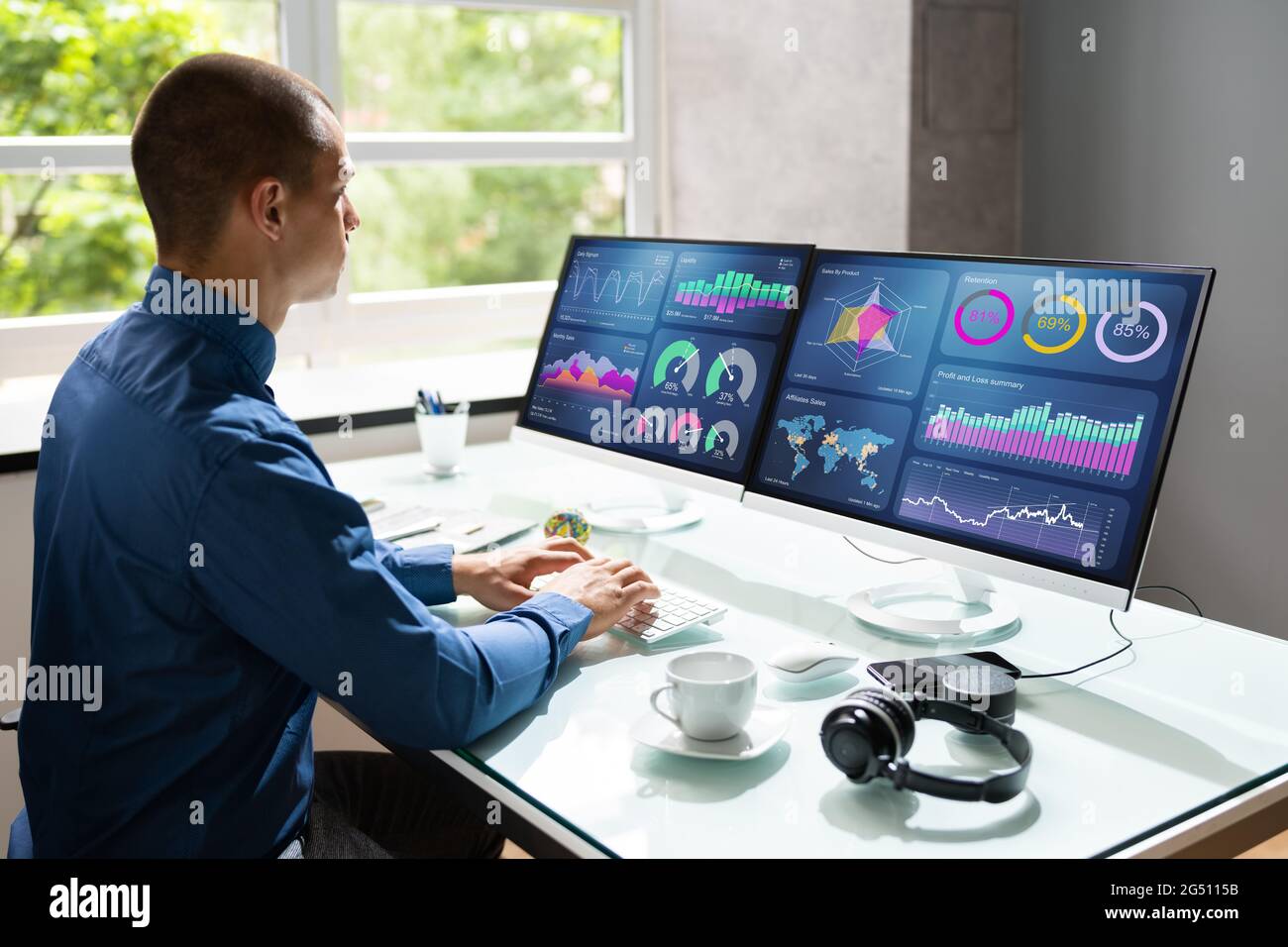 Analyst Man Using Business Data Analytics Dashboard Stock Photo - Alamy