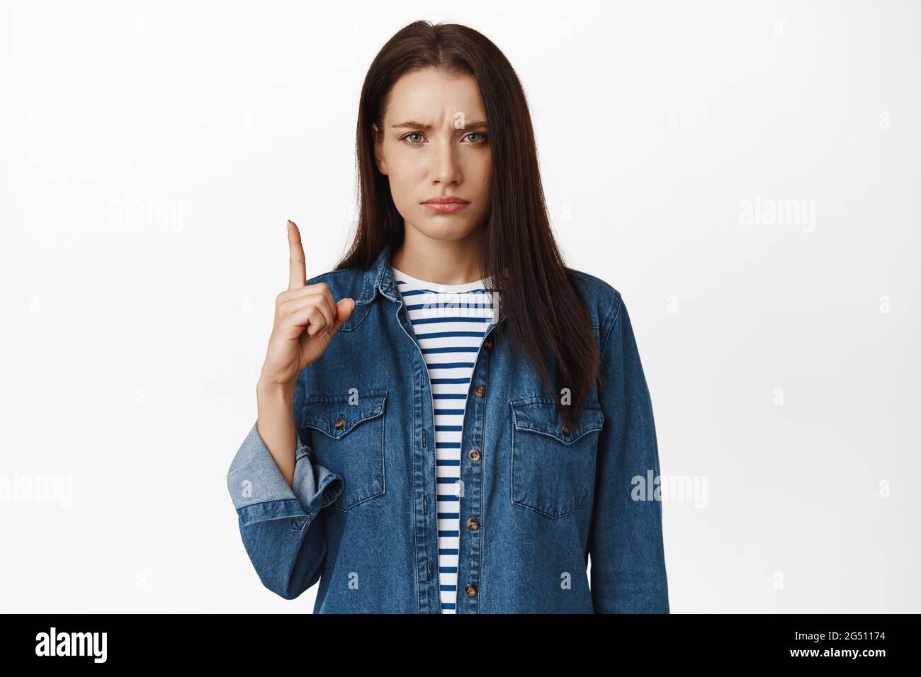Sad and disappointed girl pointing up, woman feel unfair, pointing ...