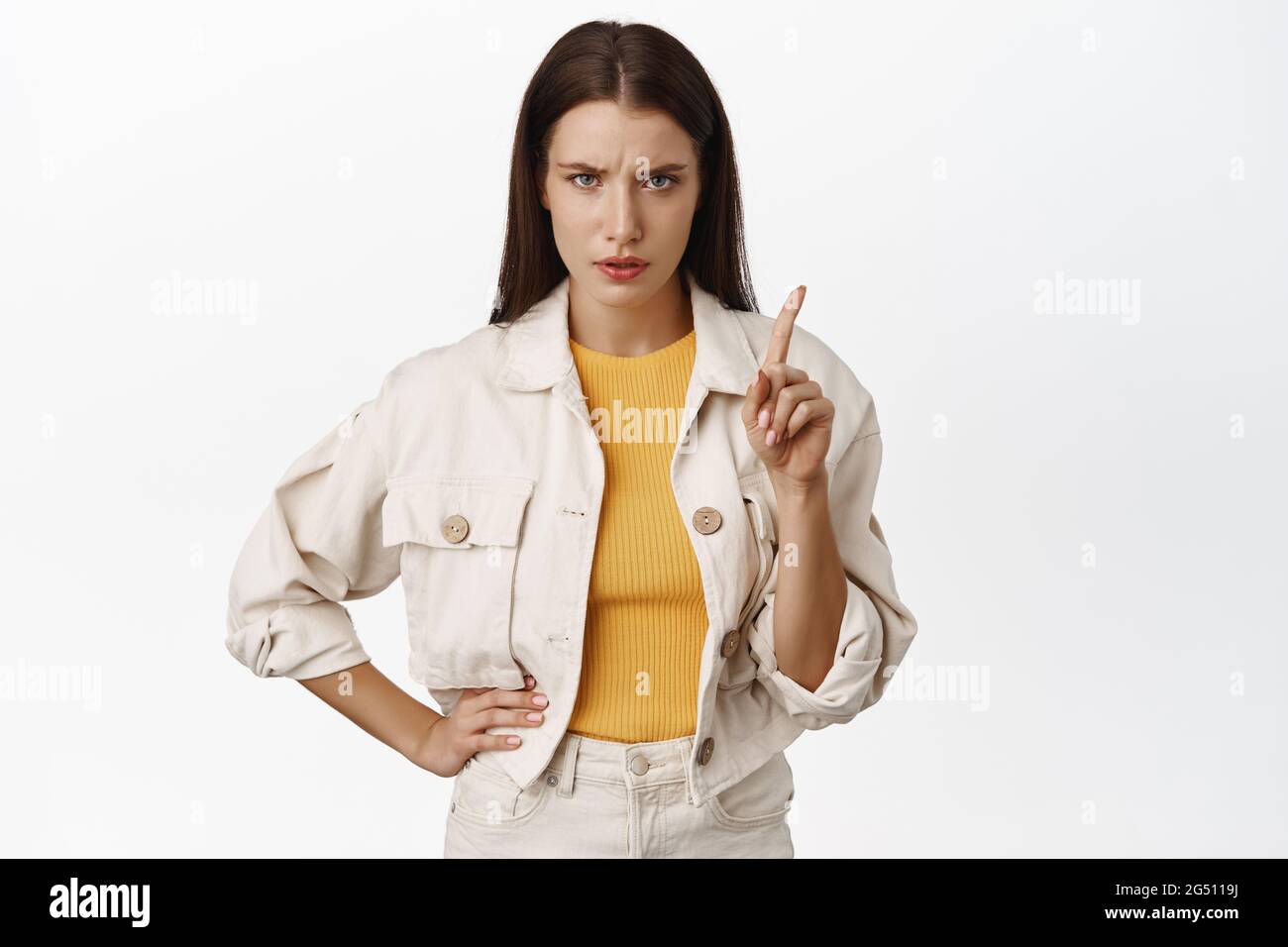 No way, stop. Serious and upset adult woman teaching lesson, shaking ...