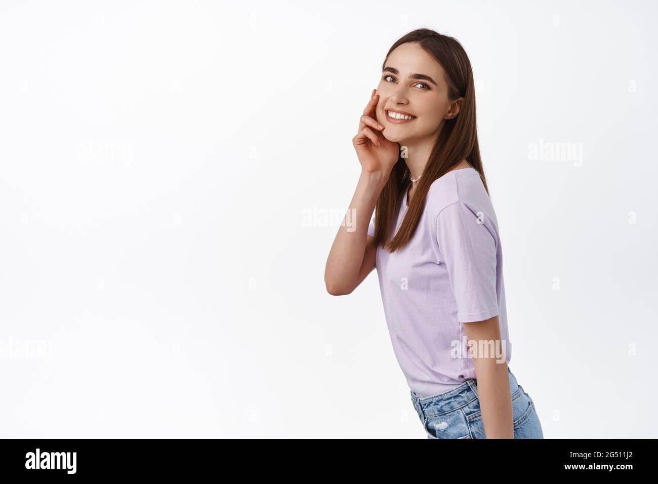 Image of beautiful girl touch her natural no make up face, smiling ...