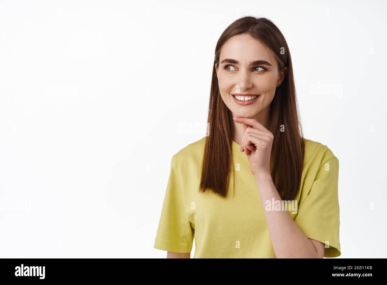 Hmm interesting, let me think. Smiling girl touch chin and thinking ...