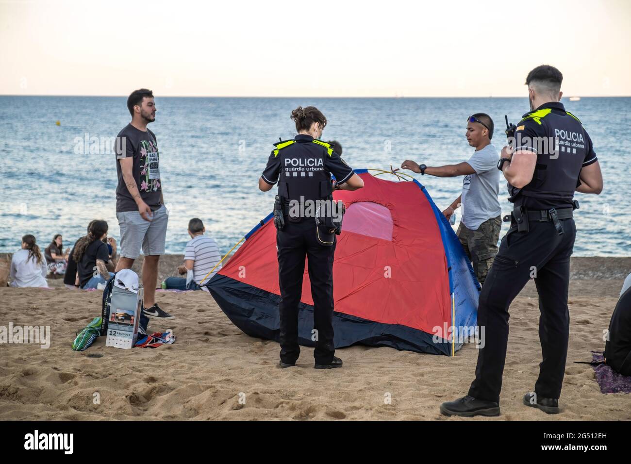 Barcelona police on beach hi-res stock photography and images - Alamy