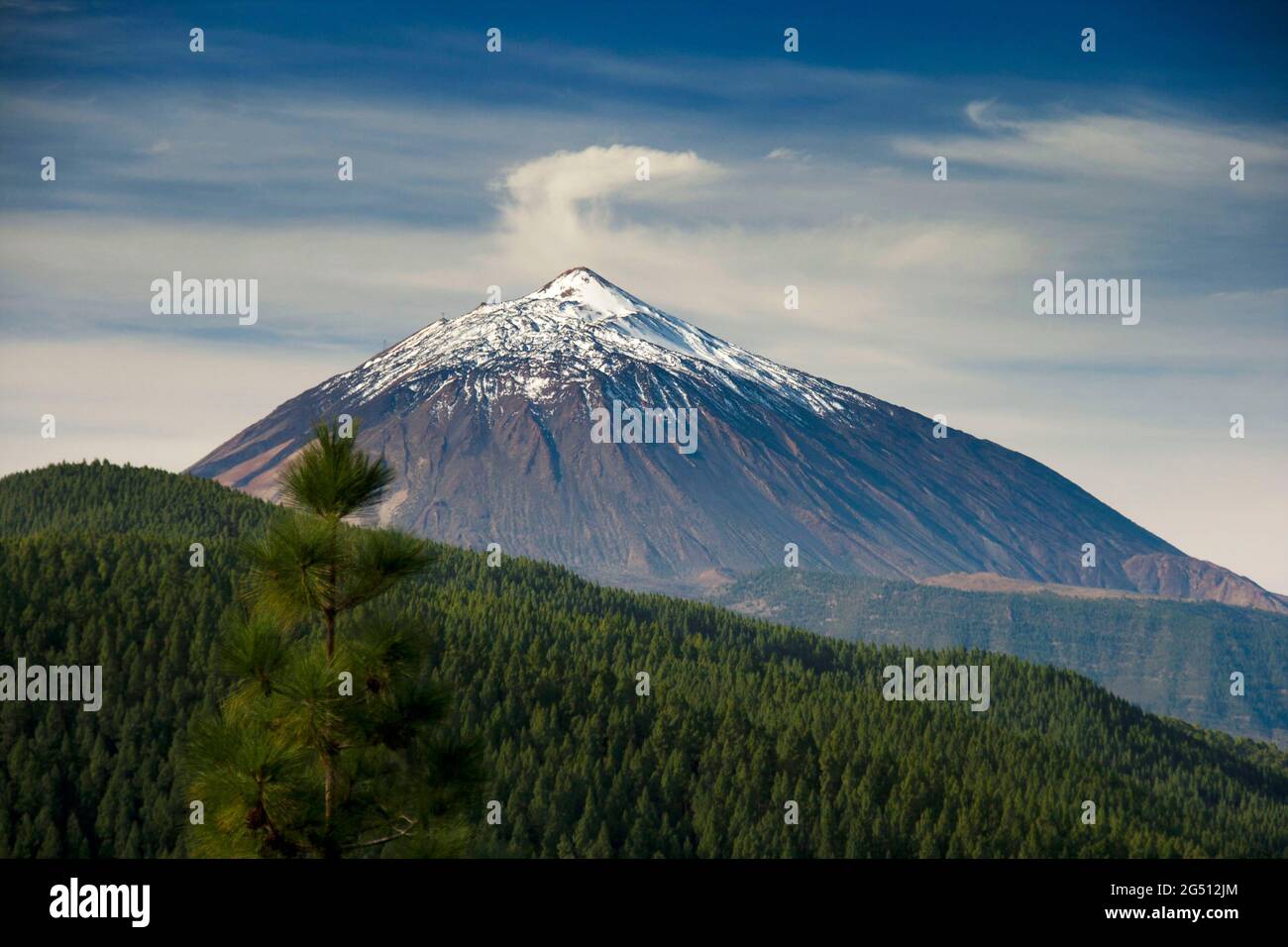 view of the Teide volcano complete with snow on the summit Stock Photo ...