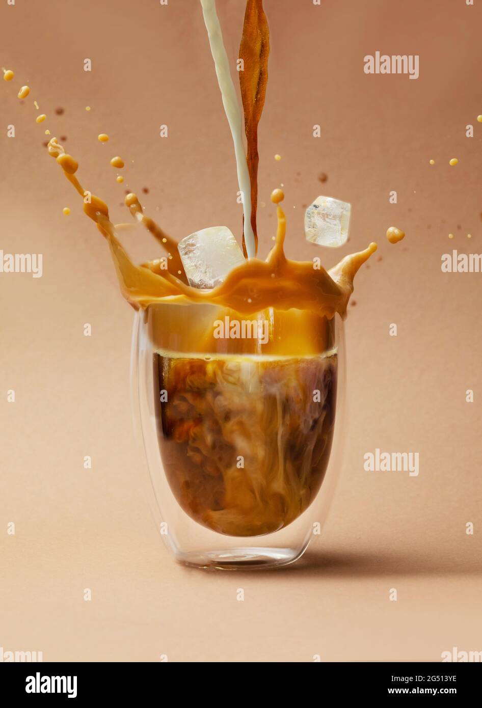Cold coffee drink with ice and milk Stock Photo - Alamy