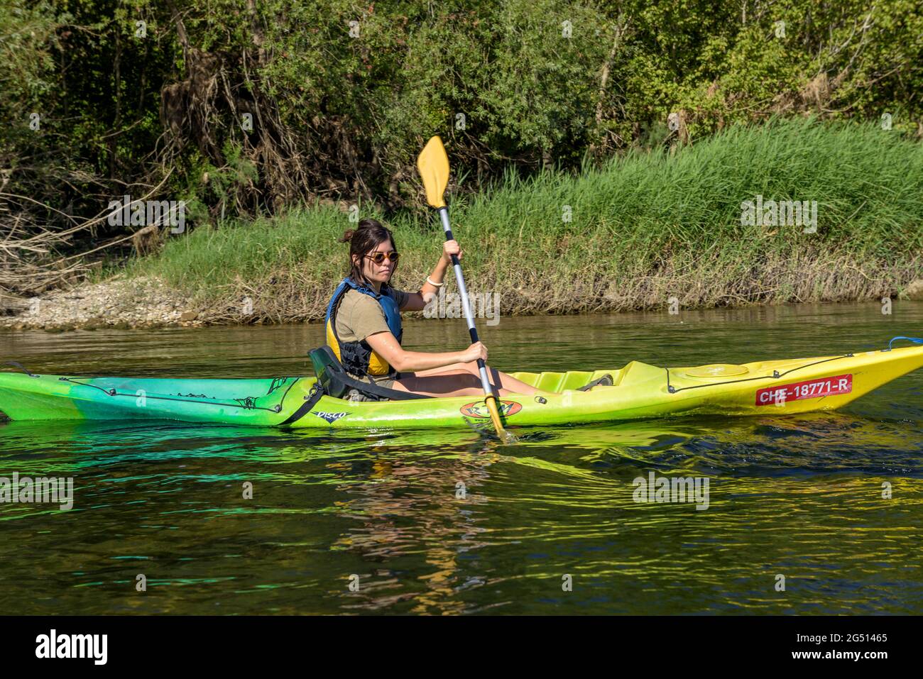 Kayaking down the Ebro river as it passes through Miravet (Ribera d ...