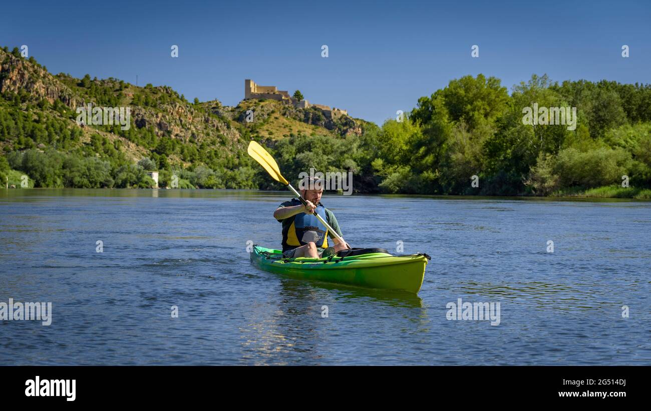 Kayaking down the Ebro river as it passes through Miravet (Ribera d ...