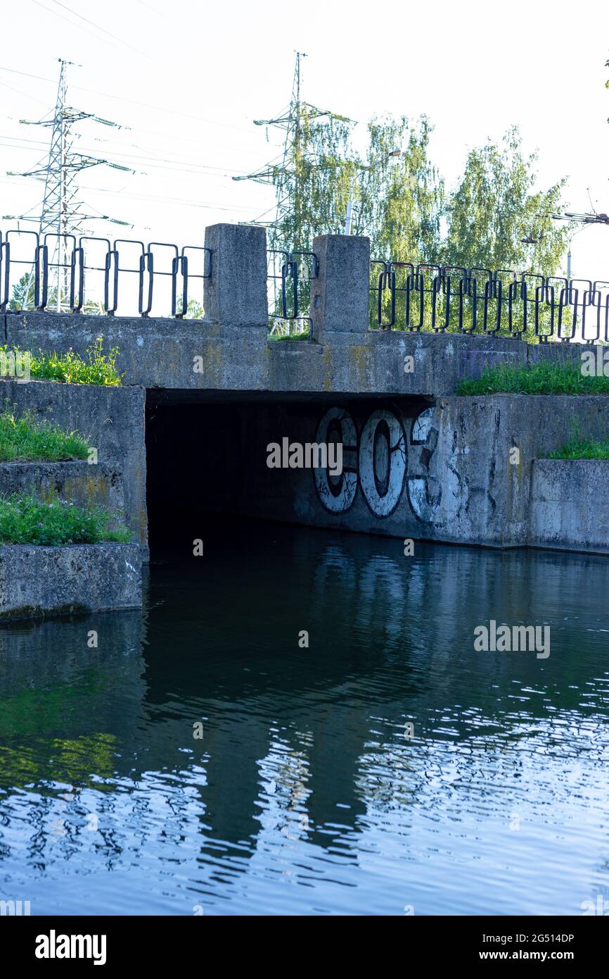 Concrete bridge over the river. Pedestrian bridge Stock Photo - Alamy
