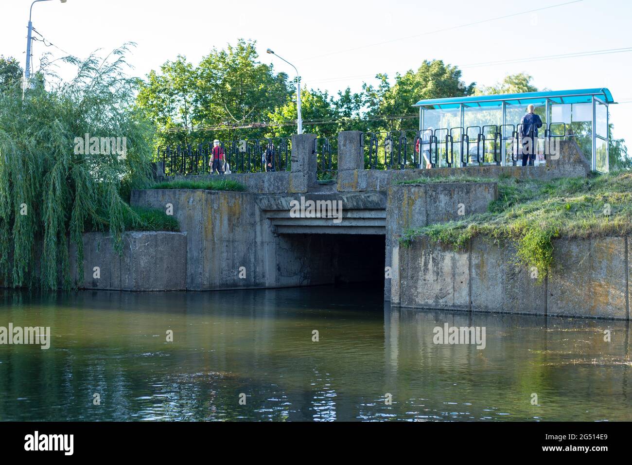 Concrete bridge over the river. Pedestrian bridge Stock Photo - Alamy