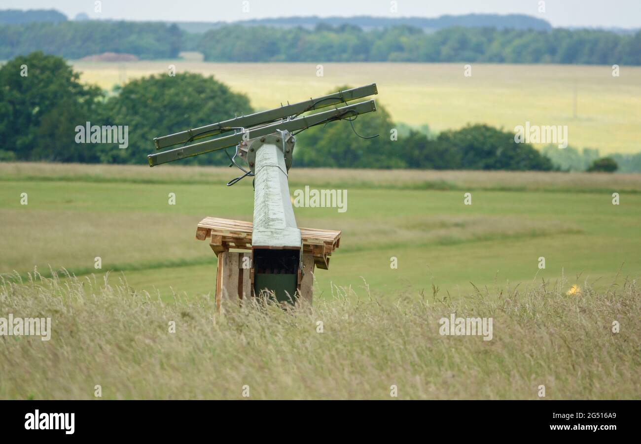 an airfield aerial mast lowered to ground level whilst undergoing ...