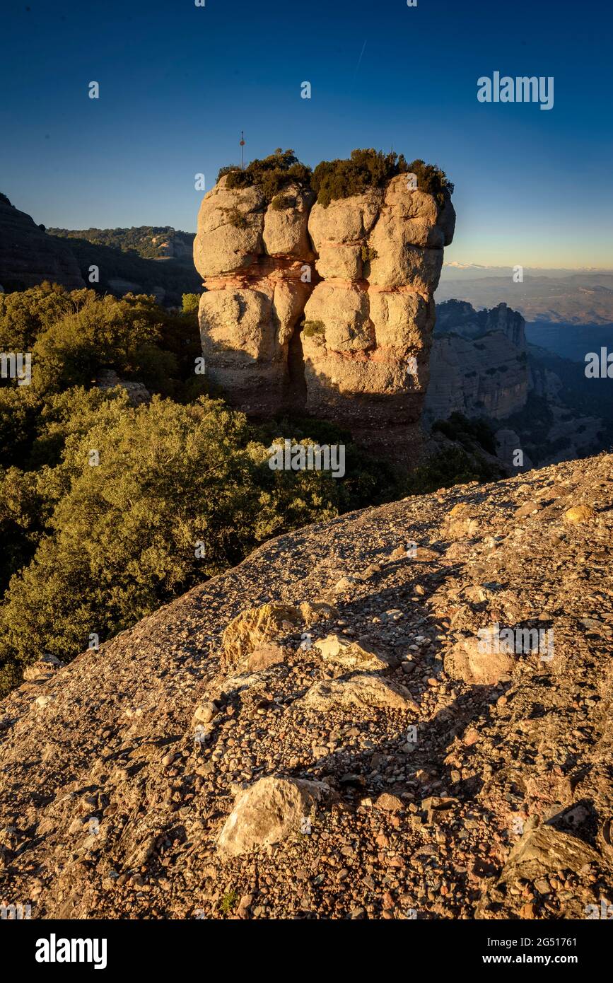 Sunset at the Morral del Drac cave, in the Sant Llorenç del Munt i l ...