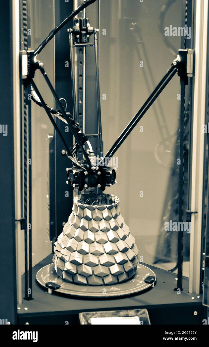 The object printed on the 3d printer stands on desktop of three-axis 3d ...