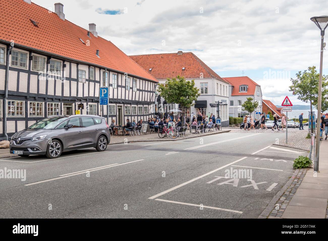 Ebeltoft, Denmark - 20 July 2020: People sitting outside Restaurant and ...