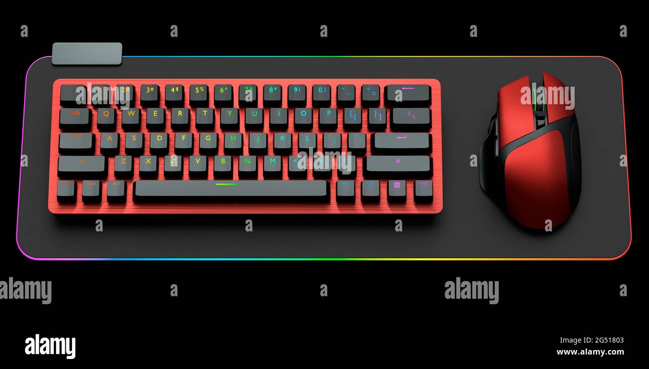 Computer keyboard and mouse on professional pad isolated on black ...