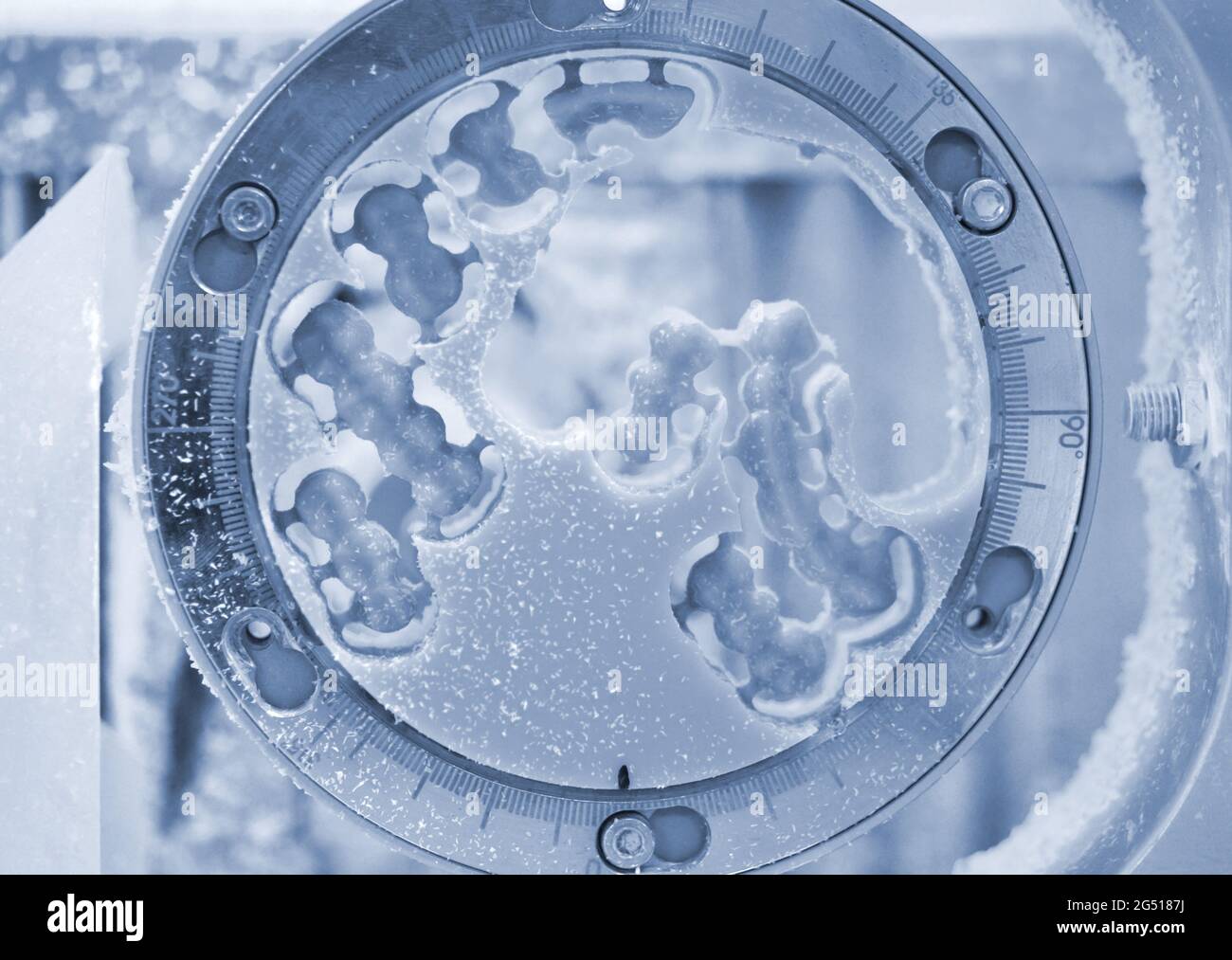 Dental milling machine carving out shape of human teeth Stock Photo - Alamy