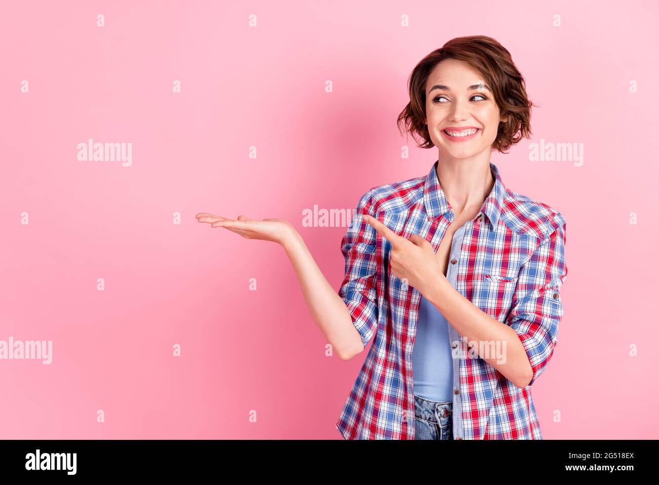 Photo of sweet adorable young lady dressed plaid shirt showing palm ...