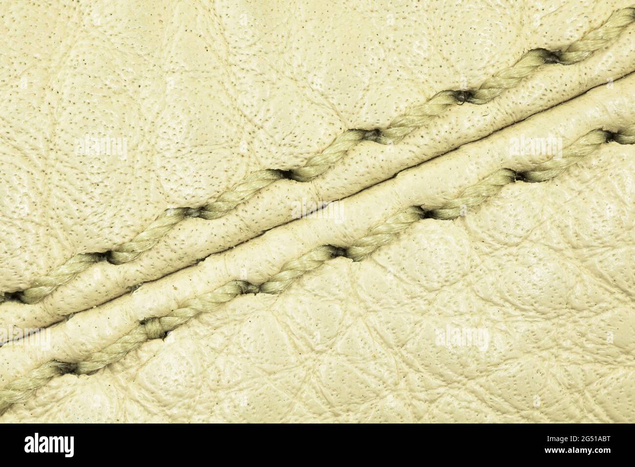 Beige leather texture and the seam close-up background, high detailed ...