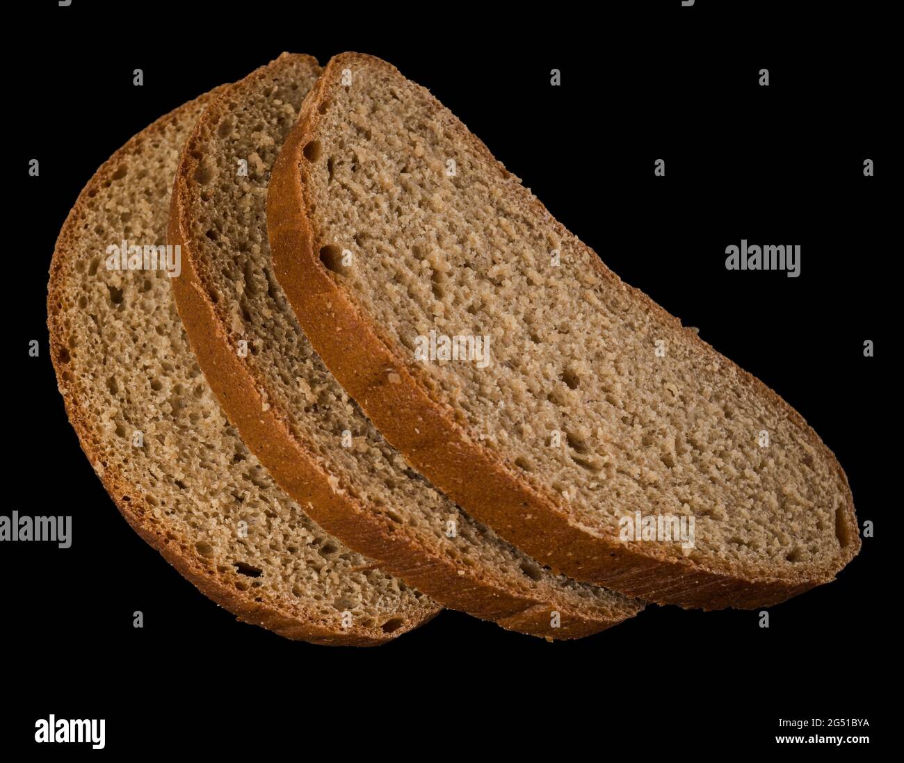 Three slices of dark bread on a black background isolated Stock Photo ...