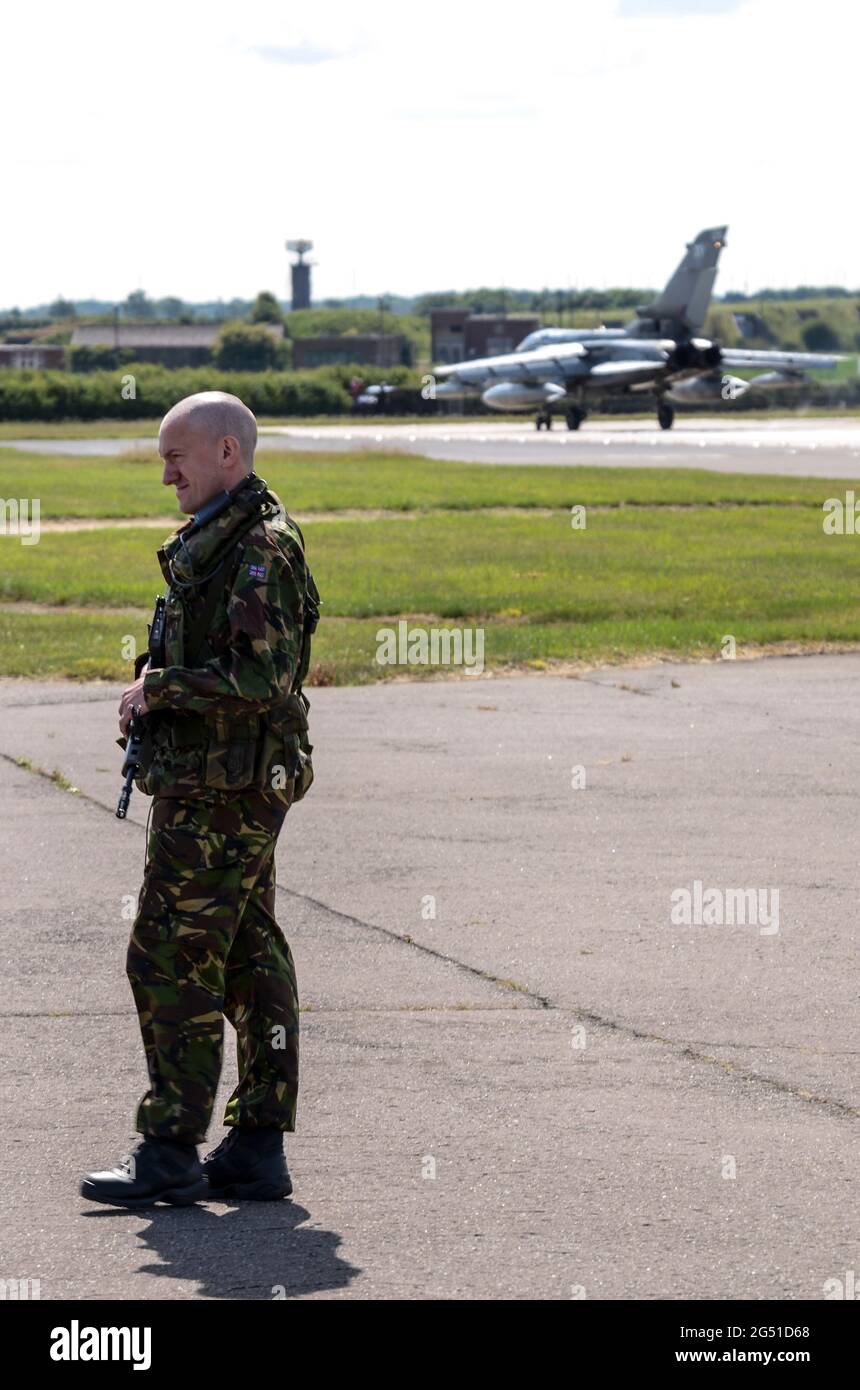 Armed military male soldier at RAF Waddington with a Royal Air Force ...