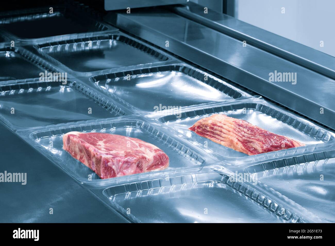 Linear food plastic tray package heat sealing machine. Food industry ...