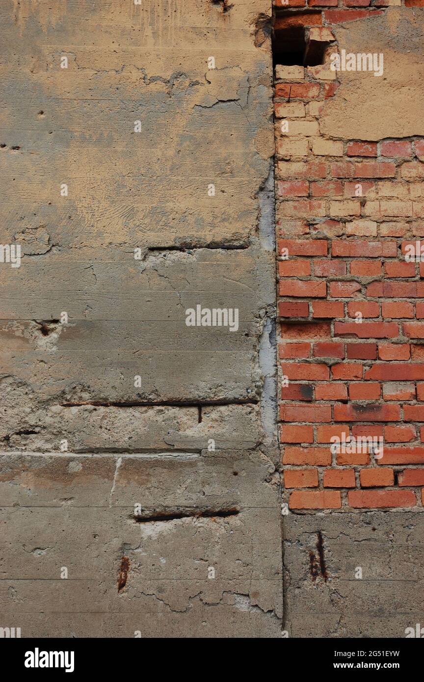 Vertical shot of damaged red brick wall texture Stock Photo - Alamy