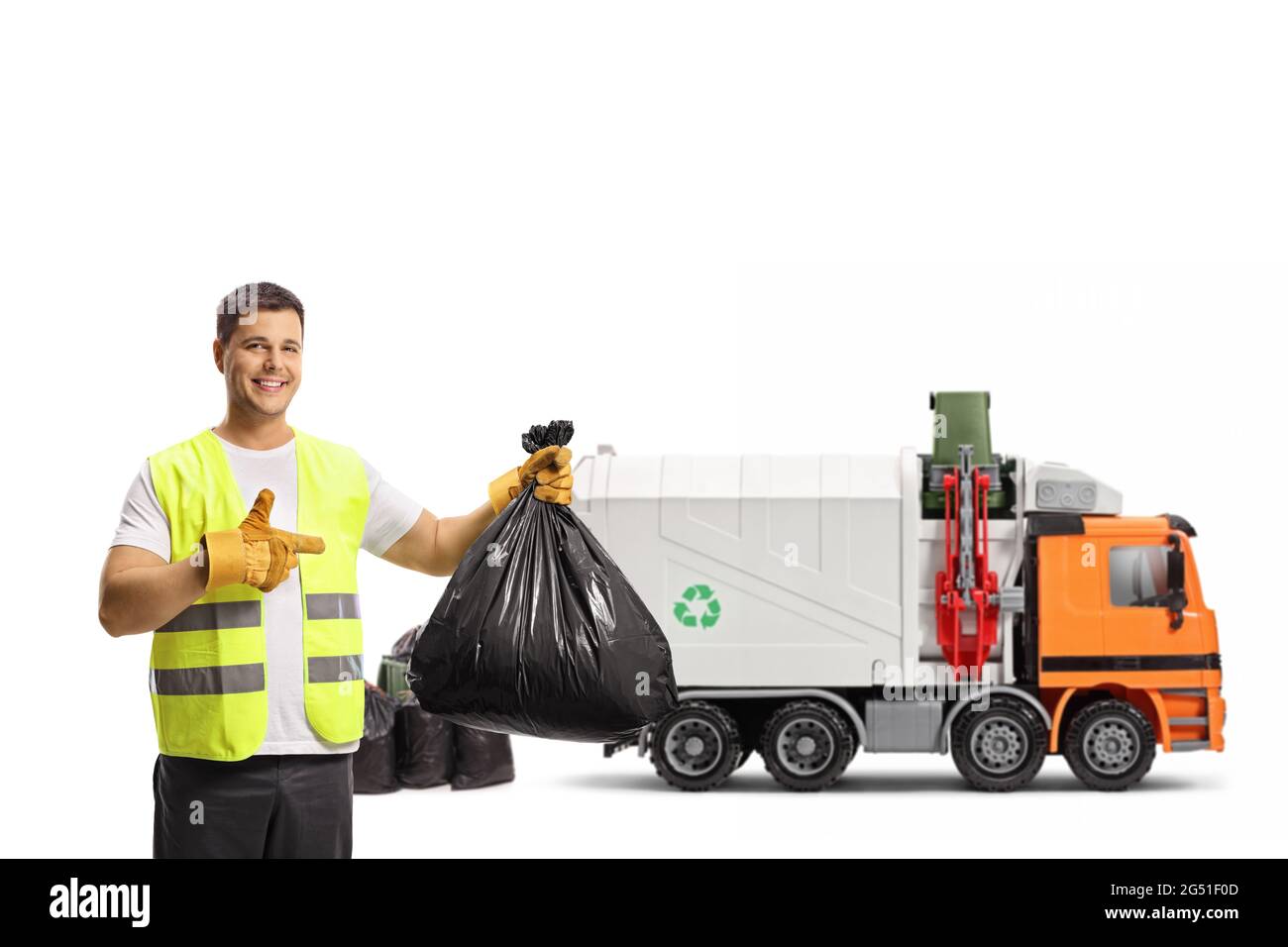 Garbage man with a truck holding a plastic bin bag and pointing ...