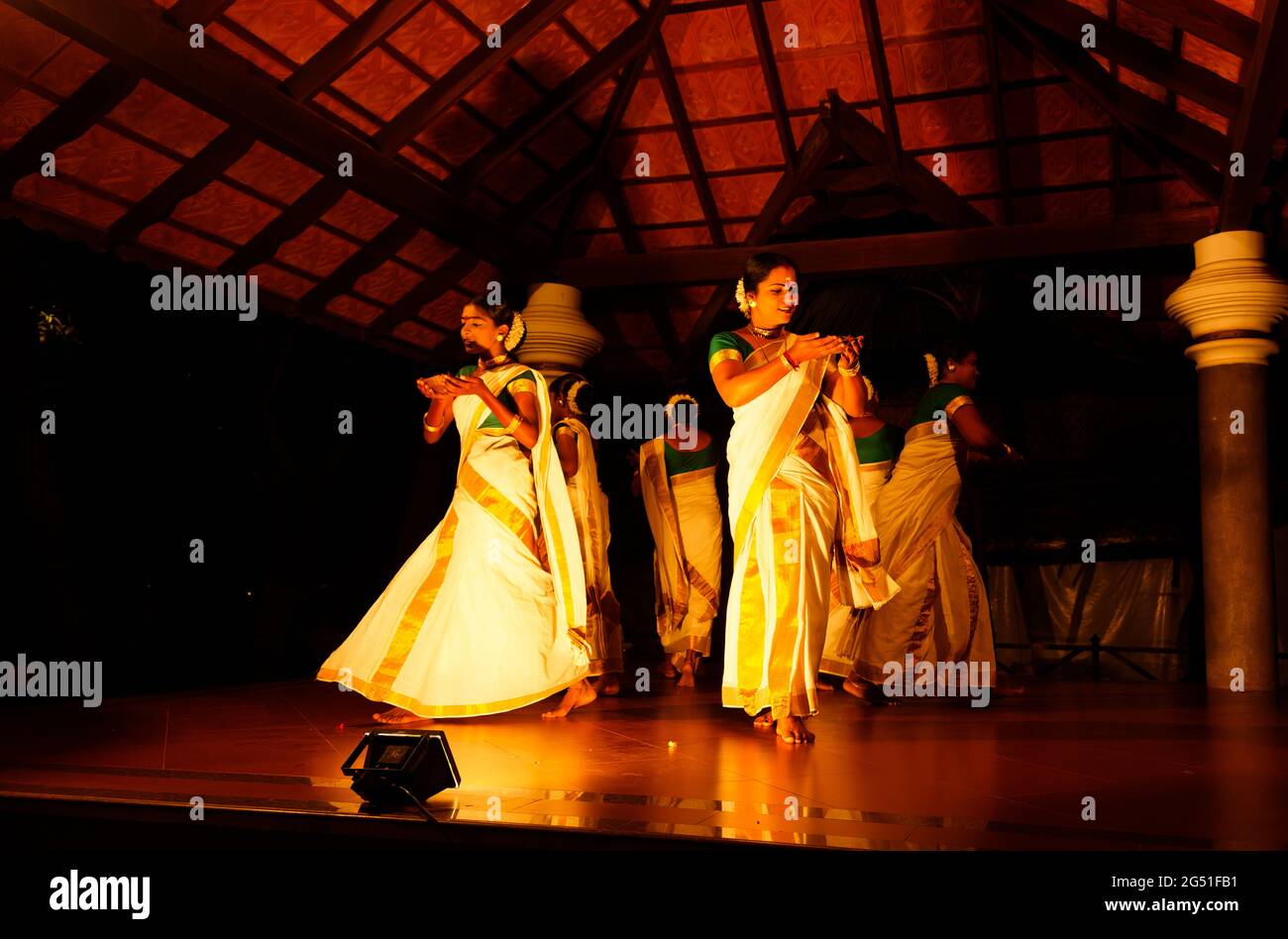 A traditional dance performance by dancers in sumptuous saris Stock ...