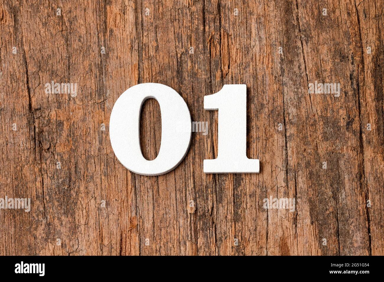 Zero one - Wooden numbers on rustic background Stock Photo - Alamy