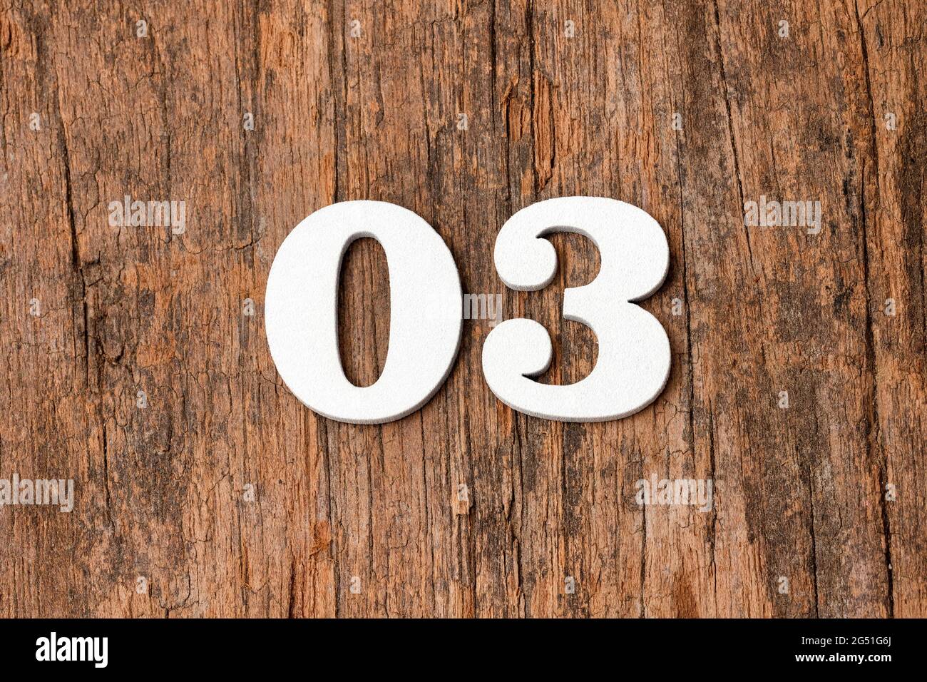 Zero three - Wooden numbers on rustic background Stock Photo - Alamy