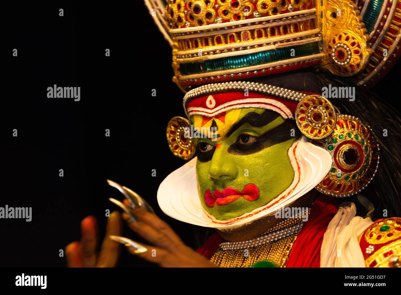 Preparation and performance of the traditional Kathakali dance form in ...
