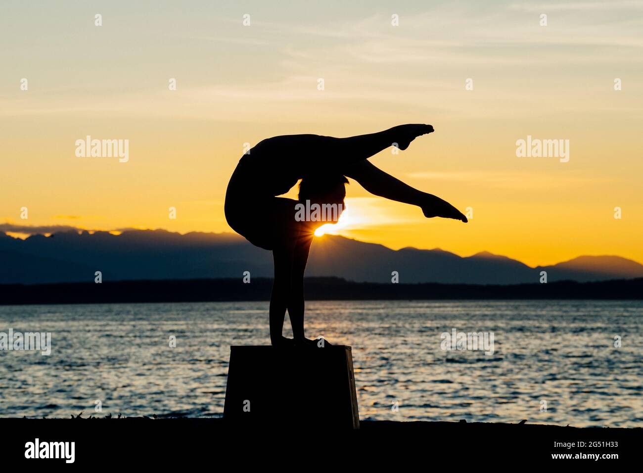 Doing handstand in sea hi-res stock photography and images - Alamy