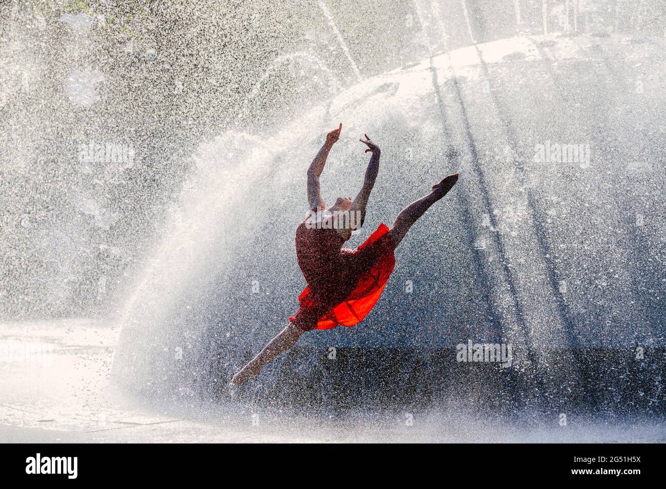 Woman dancing in red hi-res stock photography and images - Alamy