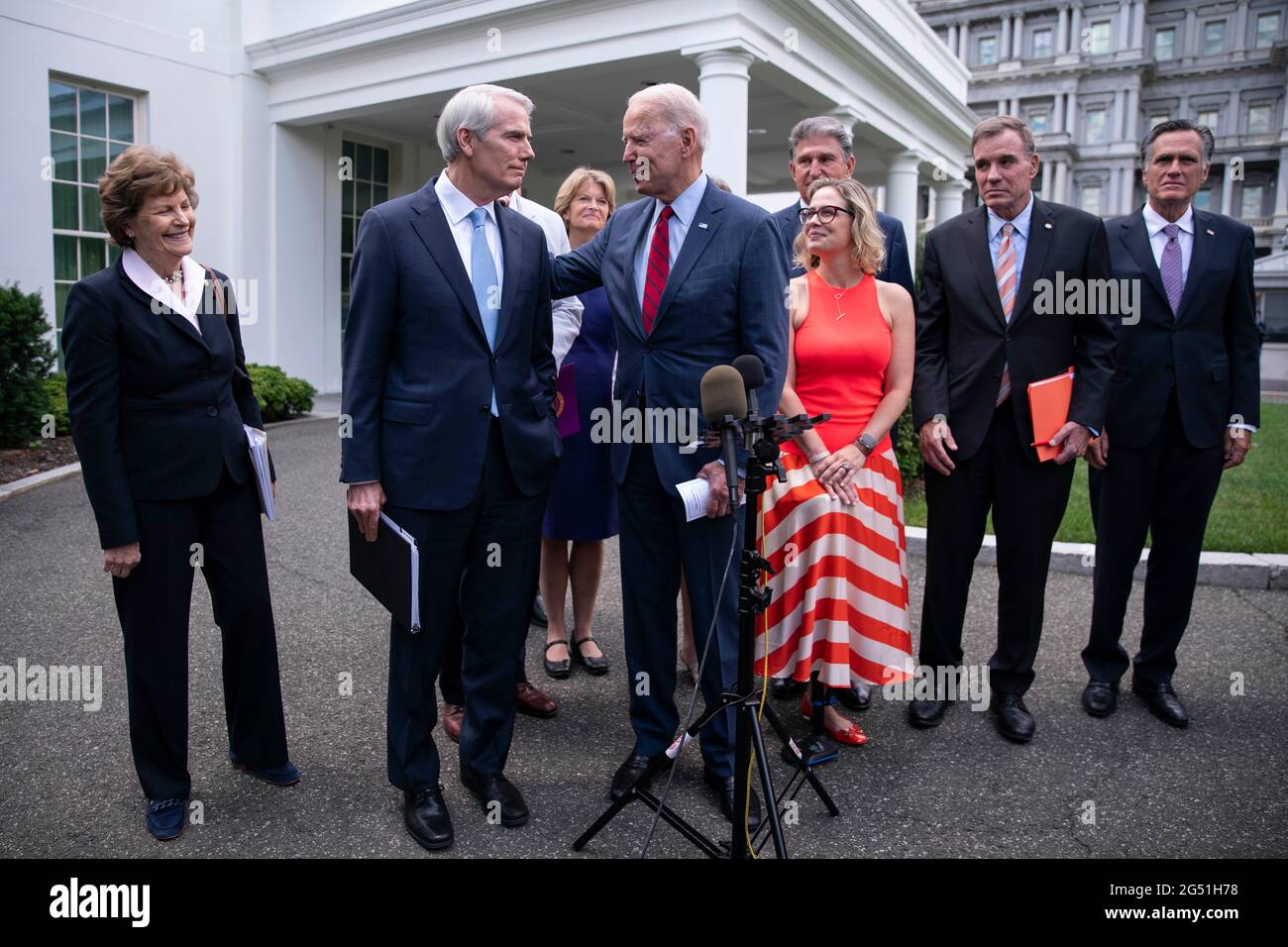 United States President Joe Biden addresses US Senator Rob Portman ...