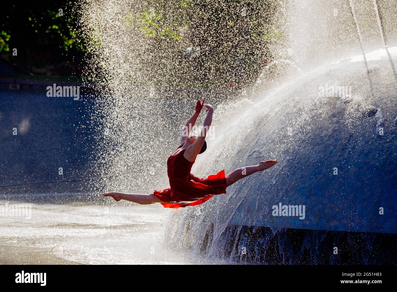 Woman dancing in red hi-res stock photography and images - Alamy
