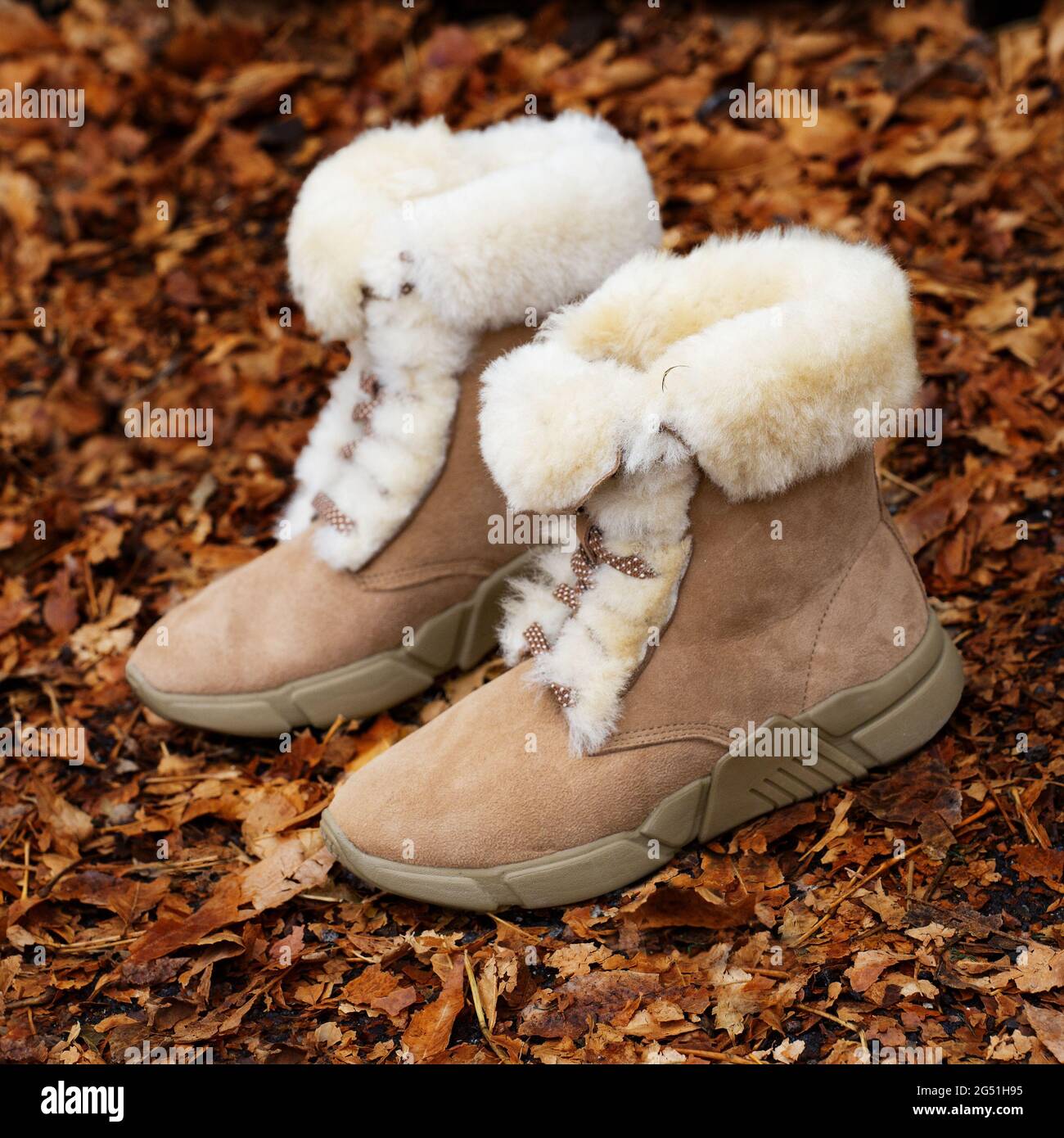 Closeup shot of a girl's warm boots for the autumn season Stock Photo ...