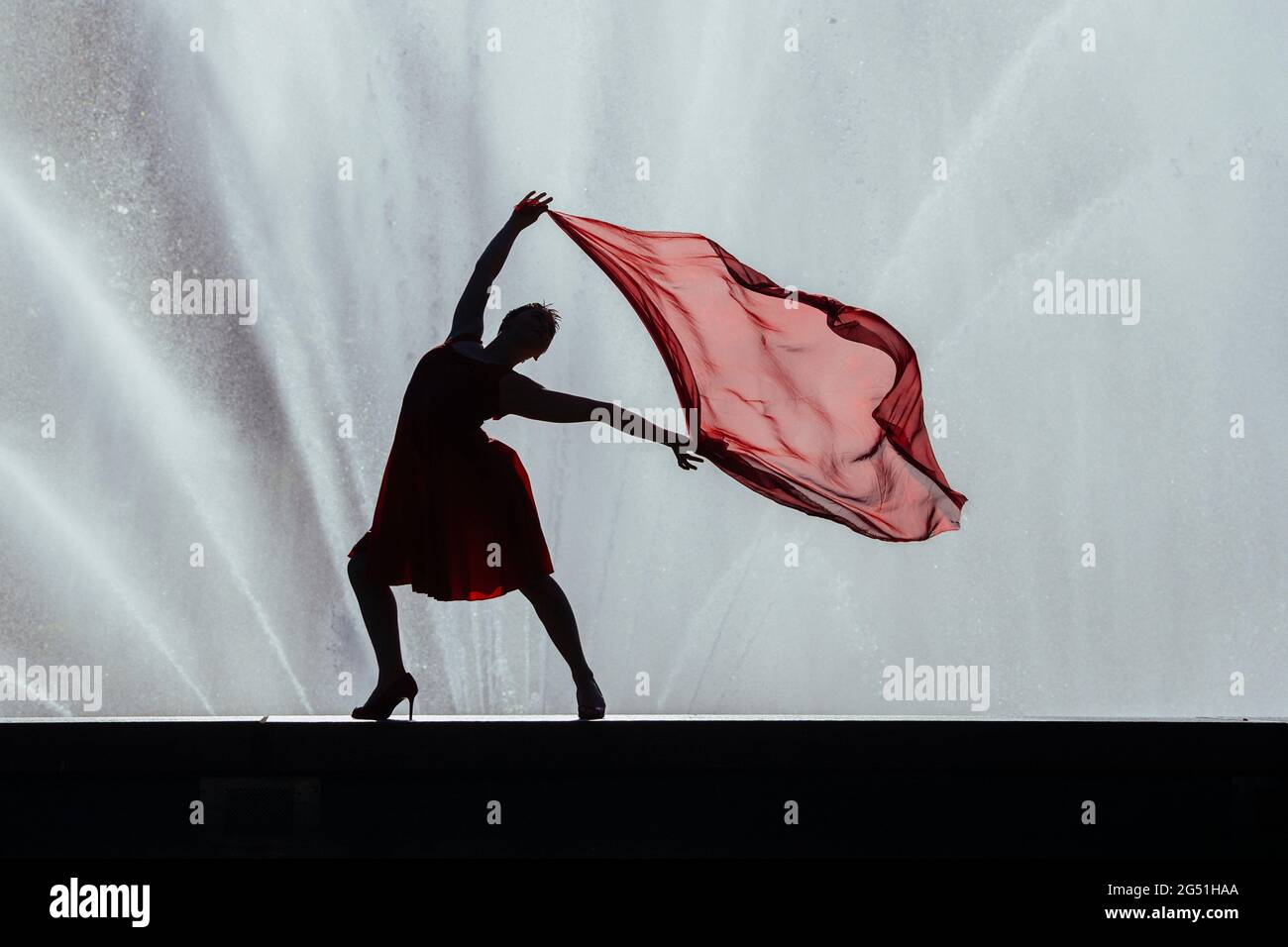 Dancing in red hi-res stock photography and images - Alamy