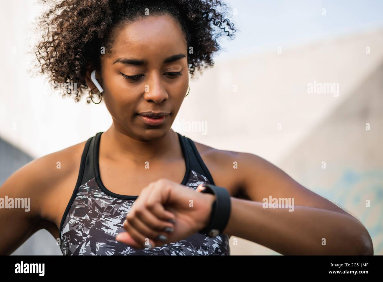 Checking smartwatch hi-res stock photography and images - Alamy