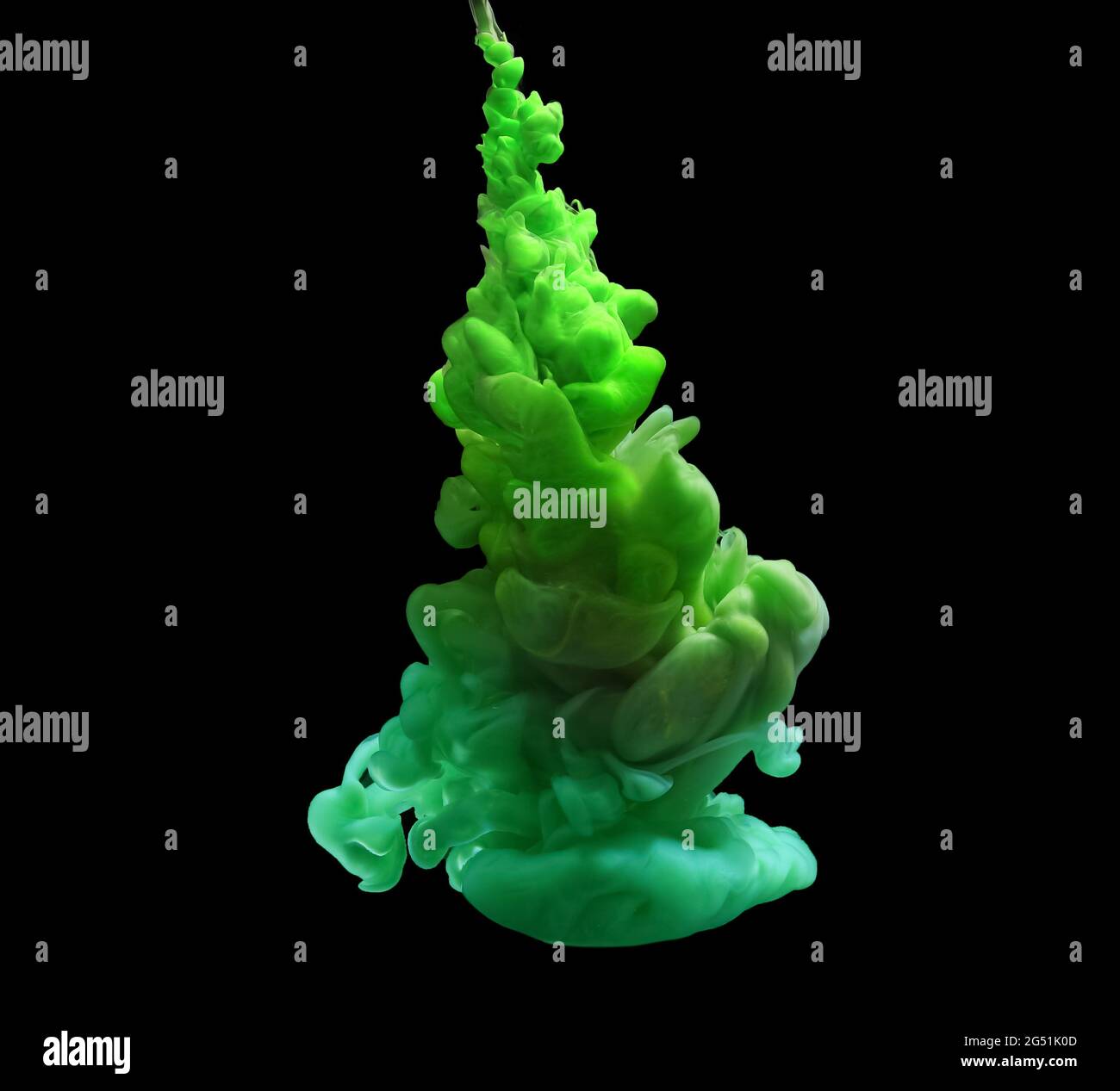 Abstract splash of green paint on dark background Stock Photo - Alamy