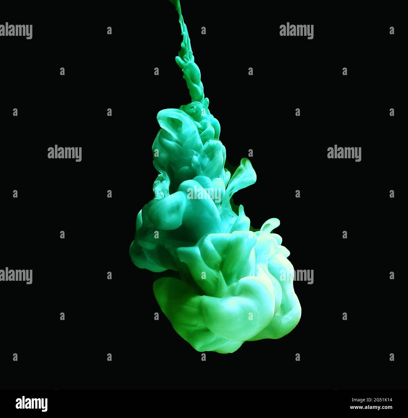 Abstract splash of green paint on dark background Stock Photo - Alamy