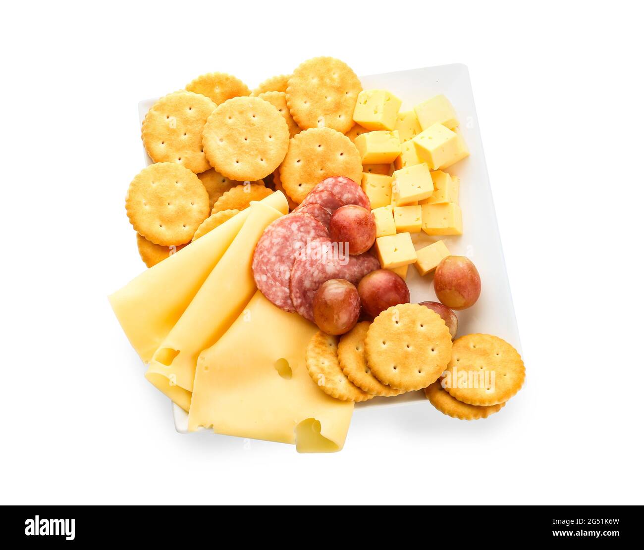 Plate with tasty crackers and snacks on white background Stock Photo ...