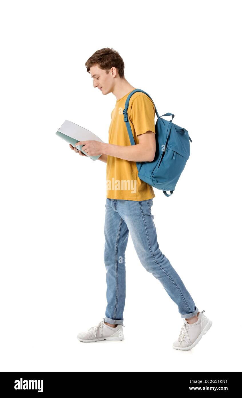 Male student with book on white background Stock Photo - Alamy