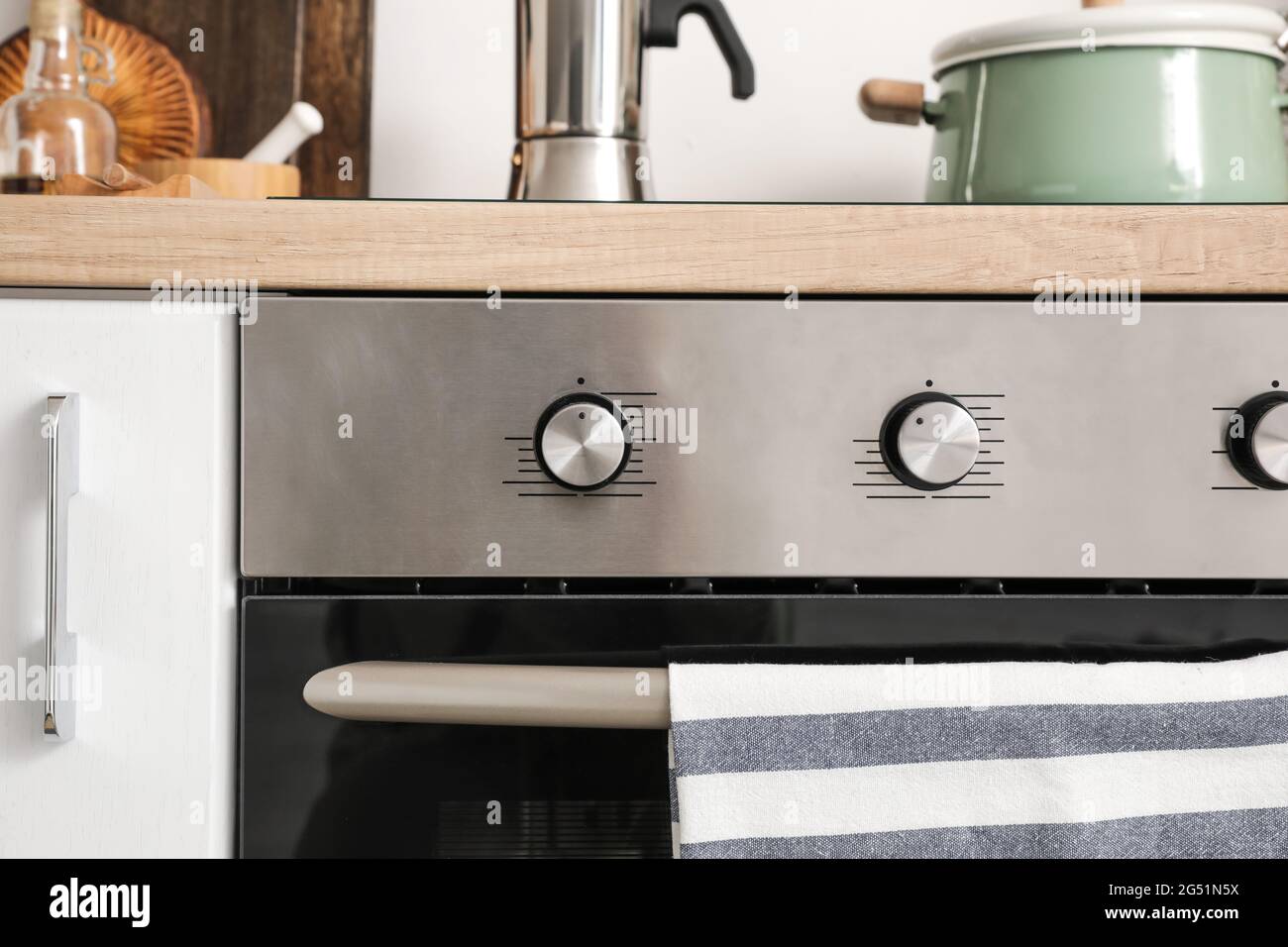 Modern electric stove in kitchen, closeup Stock Photo - Alamy