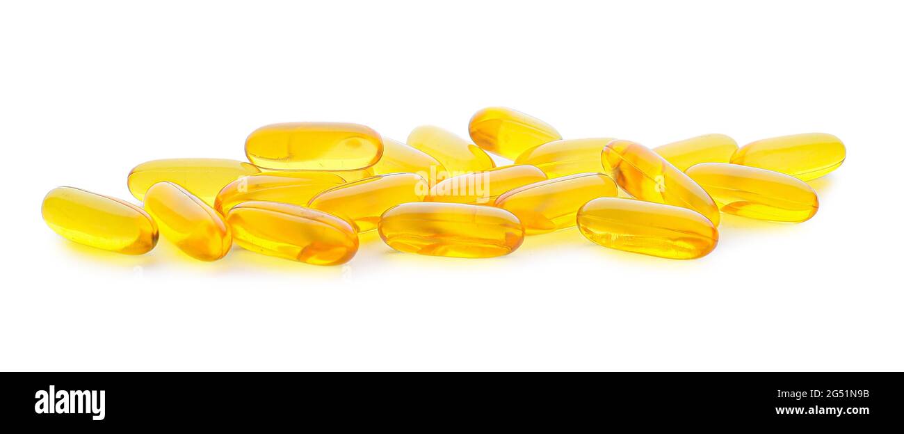 Fish oil capsules on white background Stock Photo - Alamy