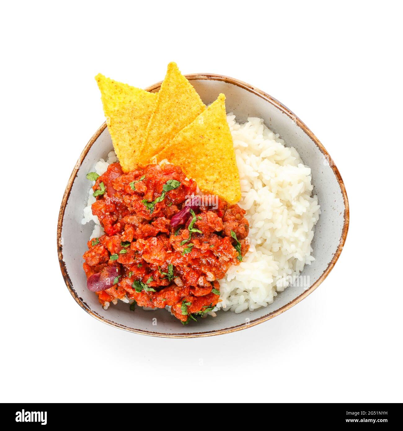 Bowl with tasty chili con carne, rice and nachos on white background ...