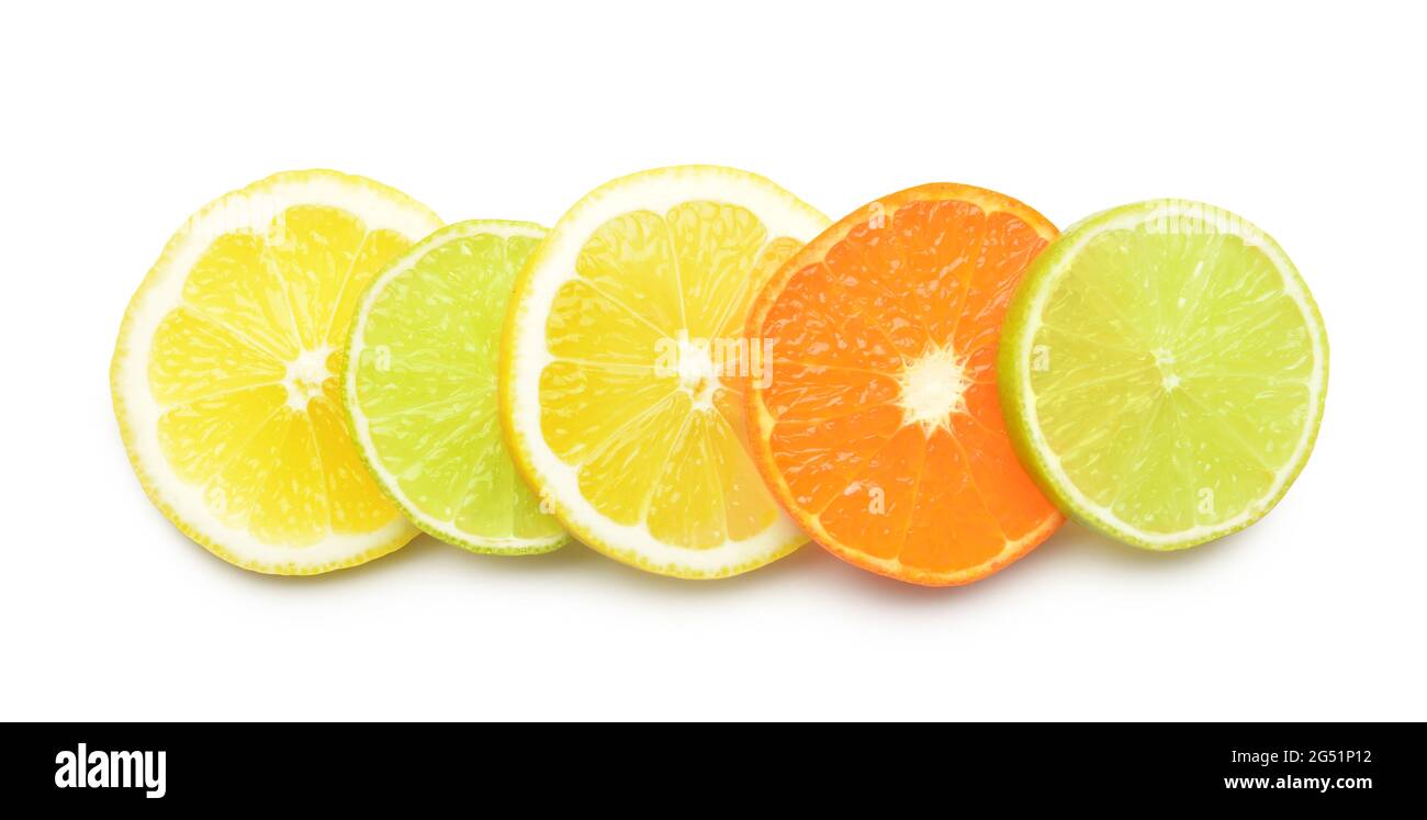 Healthy citrus fruit slices on white background Stock Photo - Alamy