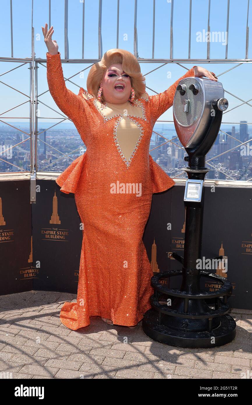 New York, USA. 24th June, 2021. Ginger Minj poses as the Empire State ...