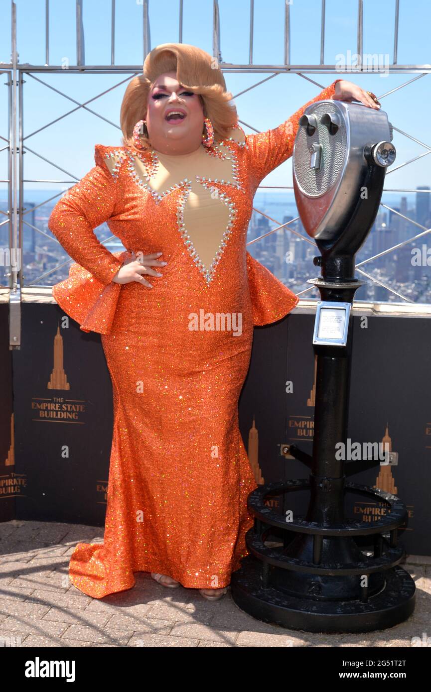 New York, USA. 24th June, 2021. Ginger Minj poses as the Empire State ...