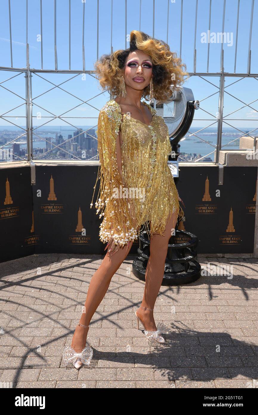 New York, USA. 24th June, 2021. Serena ChaCha poses as the Empire State ...