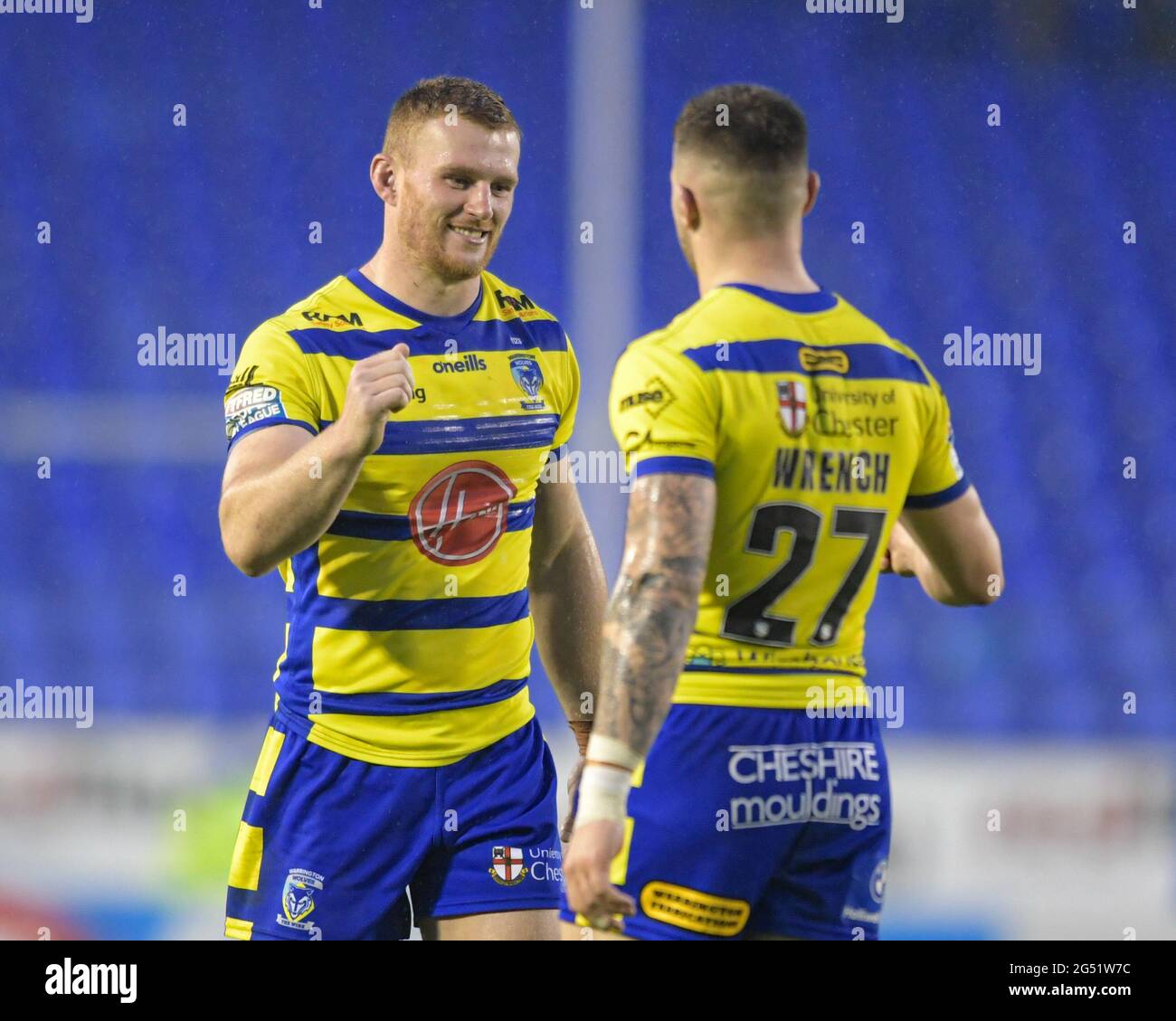 Jack Hughes (12) of Warrington Wolves and Connor Wrench (27) of ...