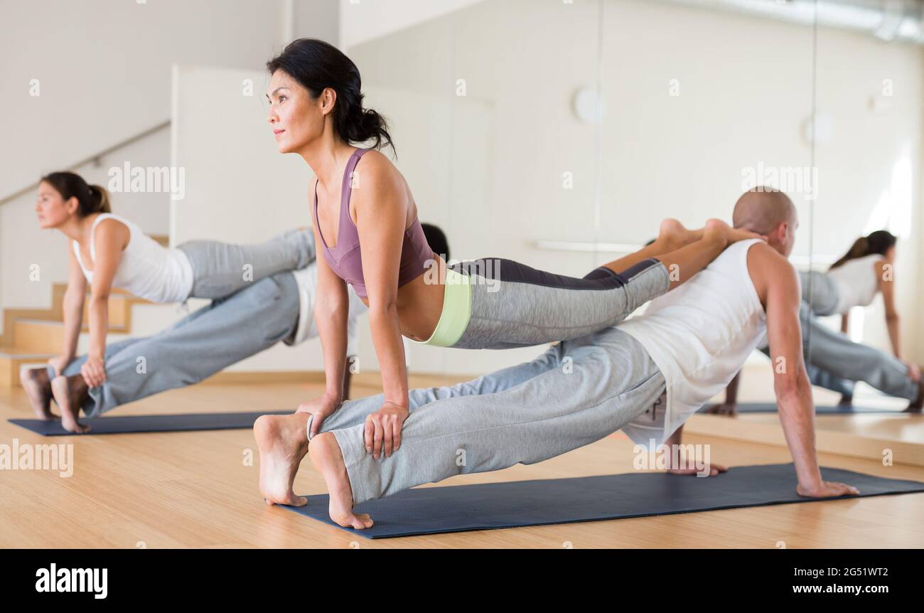 Pair yoga hi-res stock photography and images - Alamy